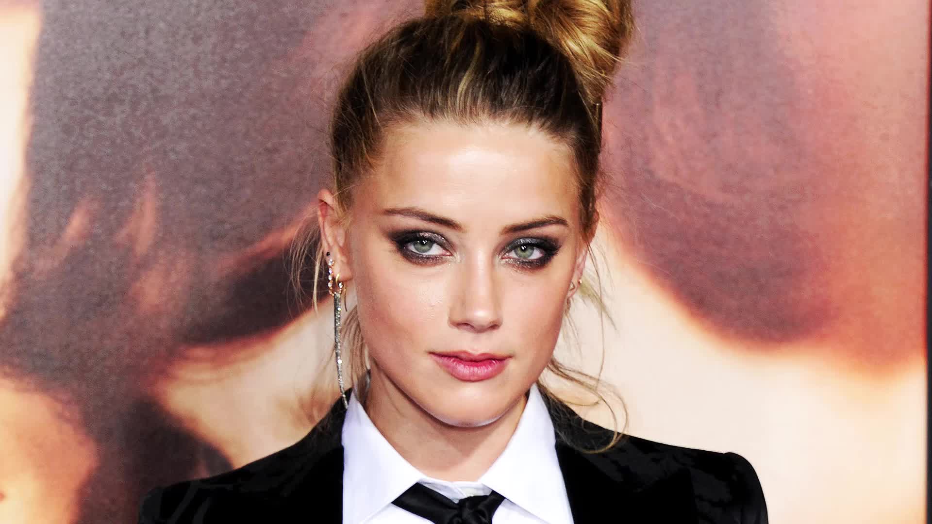 Amber Heard se declara inocente por importación ilegal de perros ...